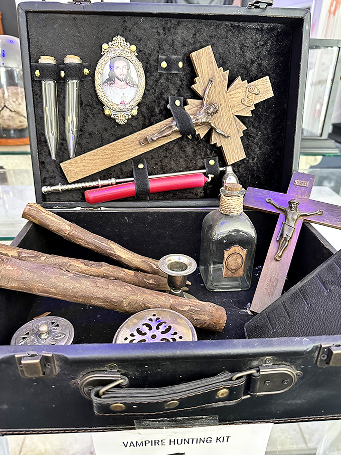 A vampire hunting kit complete with crucifix, wooden stakes, and holy water vials&mdash;essential tools for your next Transylvanian vacation.
