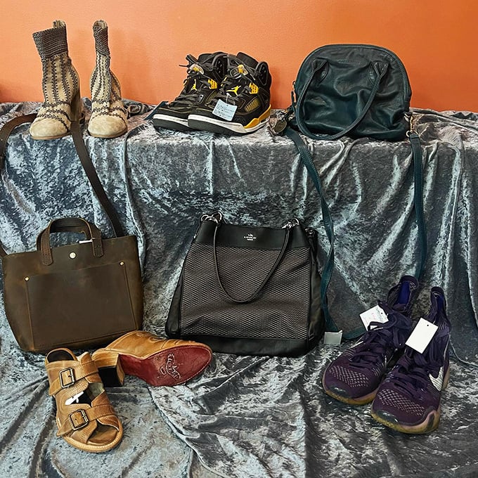 Designer meets discount in this carefully curated display. Yesterday's luxury becomes today's affordable find, with leather and labels that whisper quality.