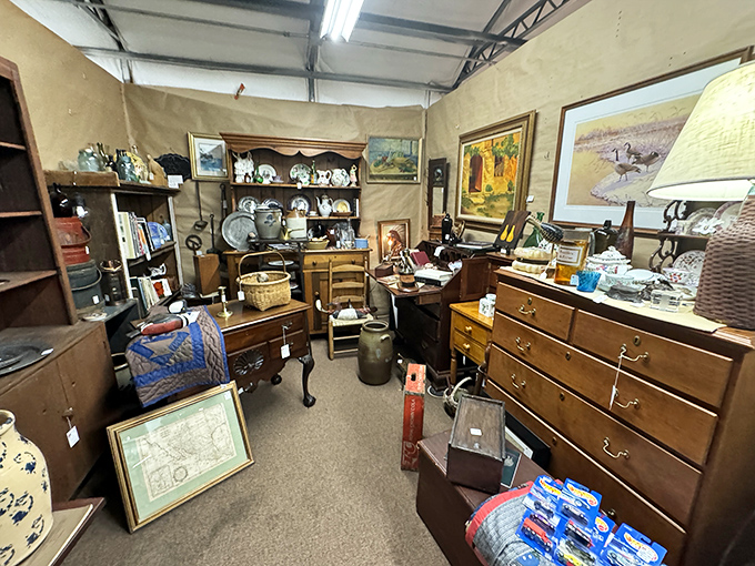 A perfectly curated chaos of nostalgia. This booth feels like rummaging through your eccentric great-uncle's attic&mdash;if he had impeccable taste.