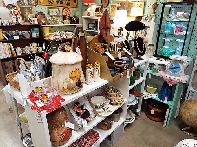 Books, china, and curiosities line these aisles like a museum where everything has a price tag and a previous life.