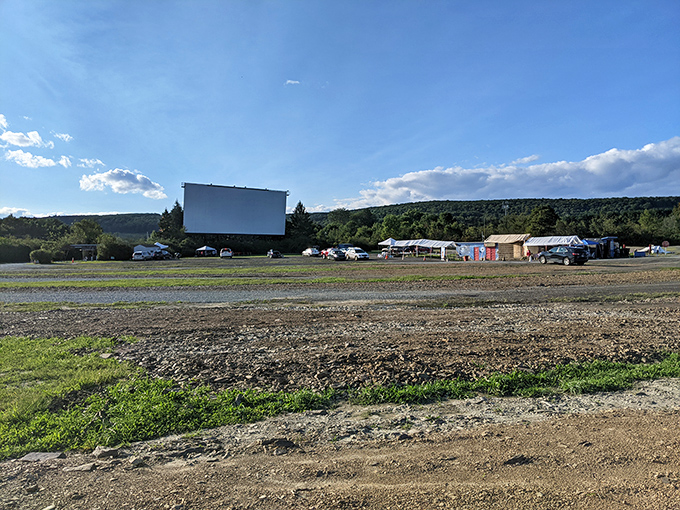 The massive screen stands sentinel against rolling Pennsylvania hills, waiting for dusk to reveal its cinematic treasures.