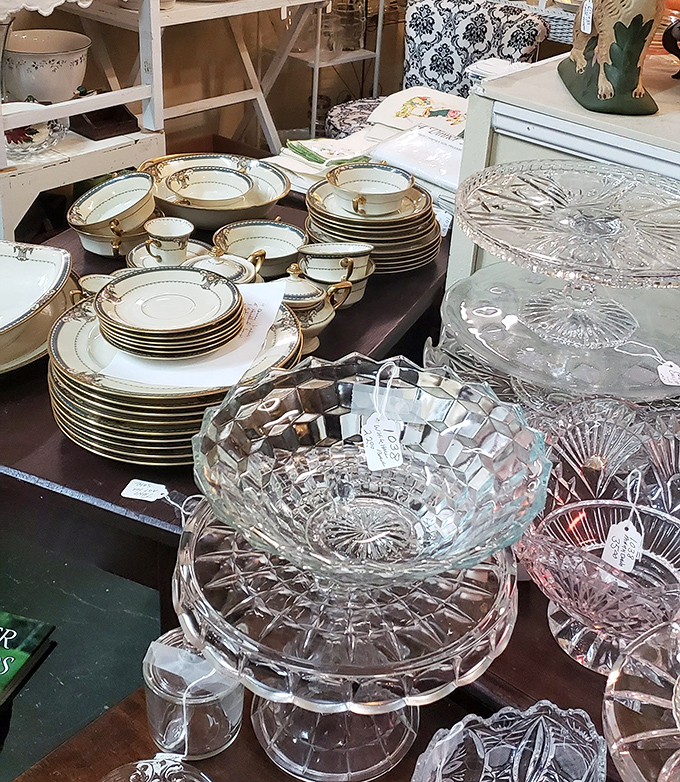 Fine china and crystal catching the light like diamonds in a cave. Grandmother's special occasion dishes, waiting for new tables to grace.