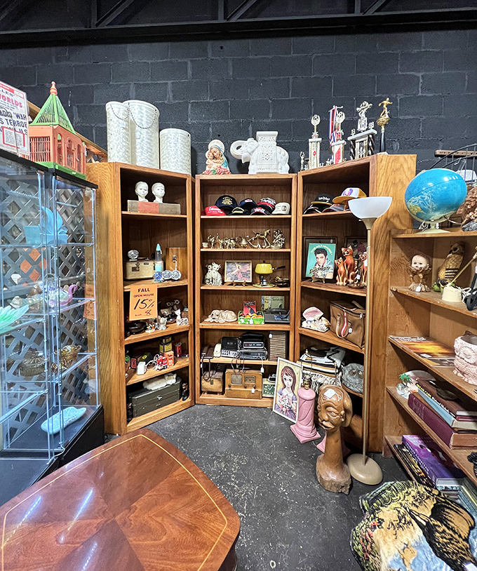 This wooden cabinet isn't just furniture&mdash;it's a time capsule housing Elvis memorabilia, vintage electronics, and knickknacks that whisper tales of Tennessee living.