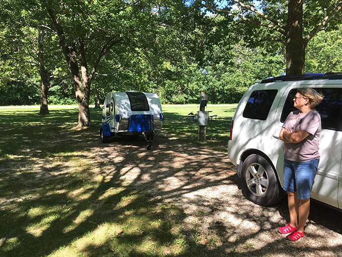 Camping done right &ndash; a teardrop trailer nestled among trees that have witnessed more family vacations than a station wagon.