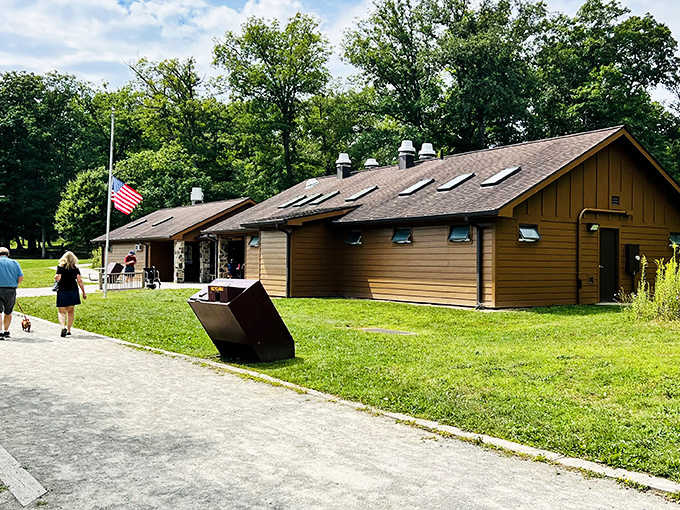 The park's facilities blend seamlessly into the landscape, their wooden exteriors aging gracefully like Robert Redford in a forest documentary.