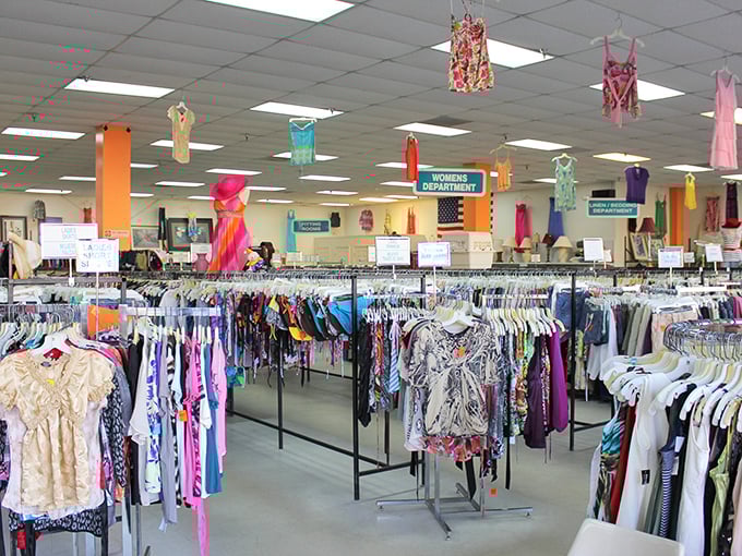 Colorful tops dancing from the ceiling like retail confetti. The women's department isn't just organized &ndash; it's curated better than some museum collections I've visited.
