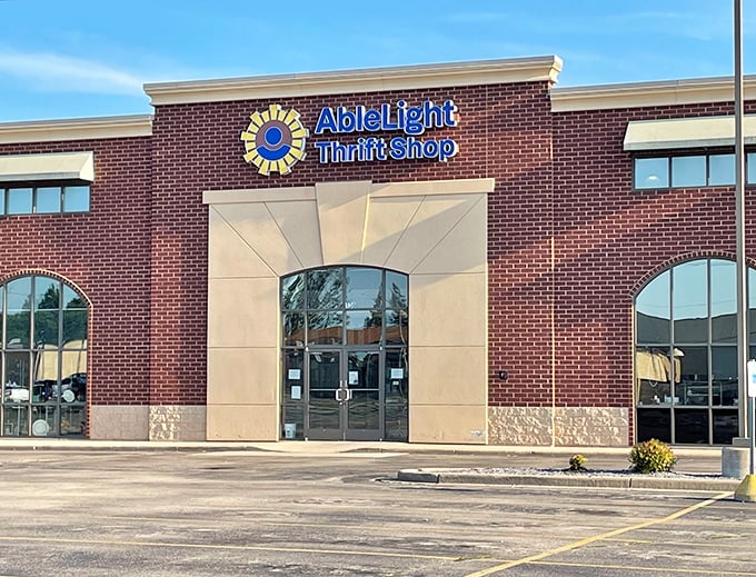 AbleLight's sunny logo brightens this modern storefront like a beacon for bargain hunters. Even the architecture says "welcome!"
