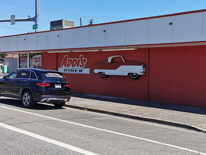 Red brick and colorful murals signal this isn't your average strip-mall breakfast joint, folks.