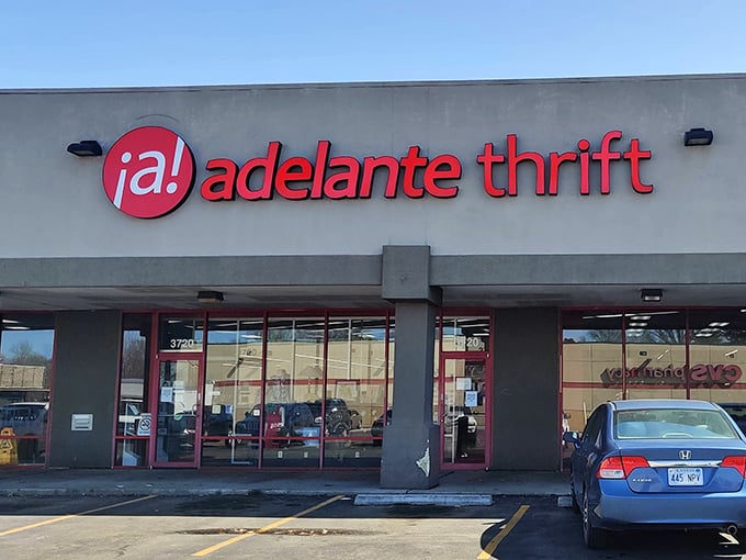 Adelante Thrift's cheerful red signage brightens even a cloudy Kansas day. That little "¡a!" is practically cheering you on to bargain victory!