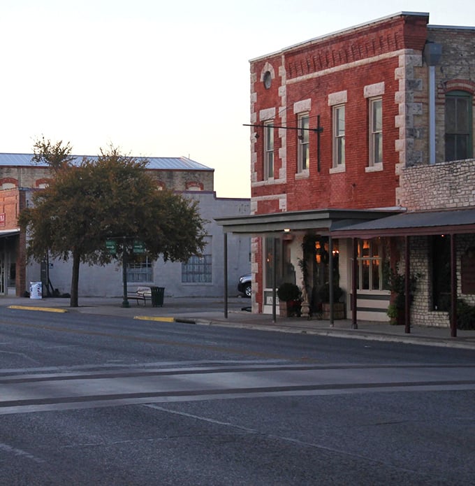 Boerne's limestone architecture whispers German heritage while the modern shops promise contemporary comforts and reasonable prices.