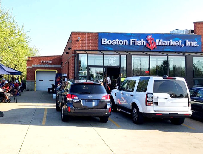Boston Fish Market's busy parking lot tells the real story&mdash;fresh seafood draws serious crowds.