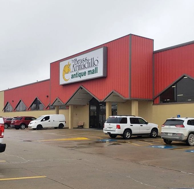 The Brass Armadillo's red barn exterior hints at the Wild West adventure waiting inside this antique wonderland.