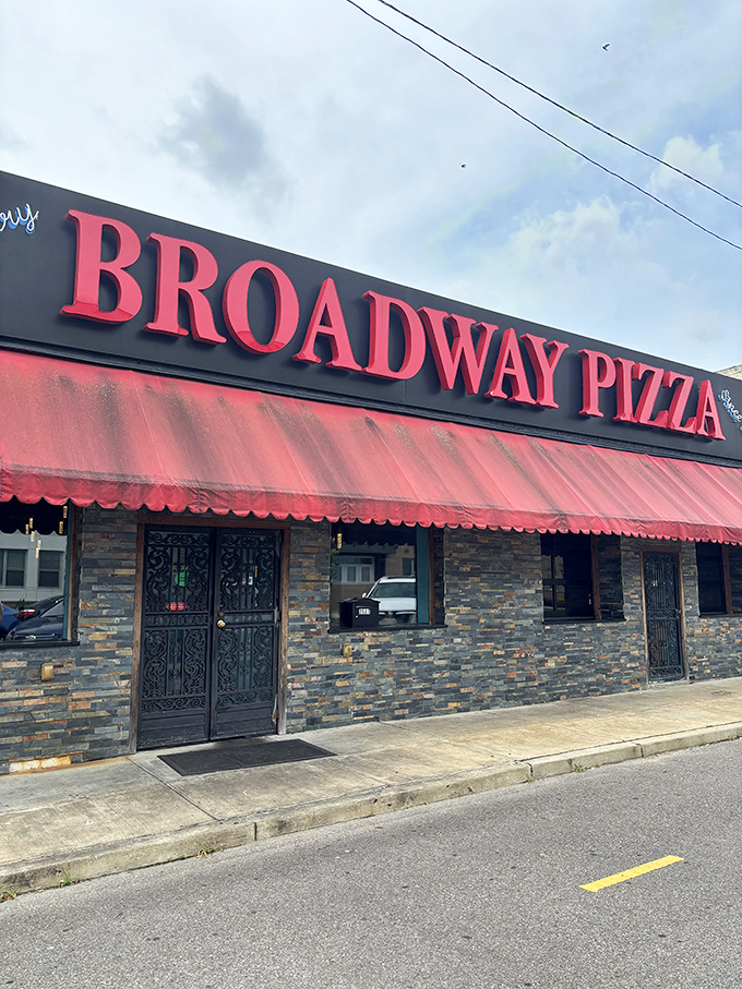 Broadway Pizza's no-nonsense exterior hides flavor explosions within. Memphis knows: don't judge a pizzeria by its awning.