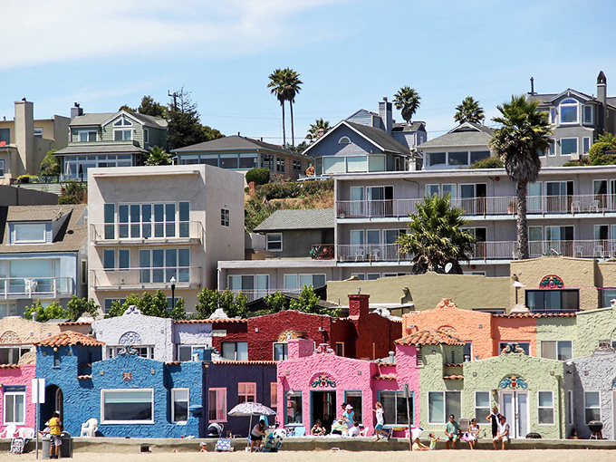 Capitola's famous rainbow houses look like someone spilled a paint box on the beach.
