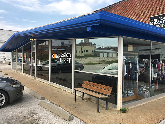 That blue awning beckons like a beacon for bargain hunters seeking their next great discovery.