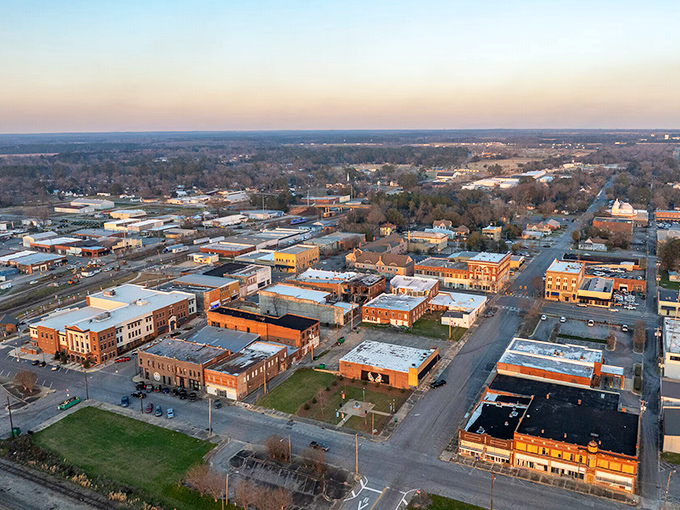 Sunlight bathes Cordele's peaceful small town panorama, where brick buildings and wide streets create an affordable haven away from big-city hustle.
