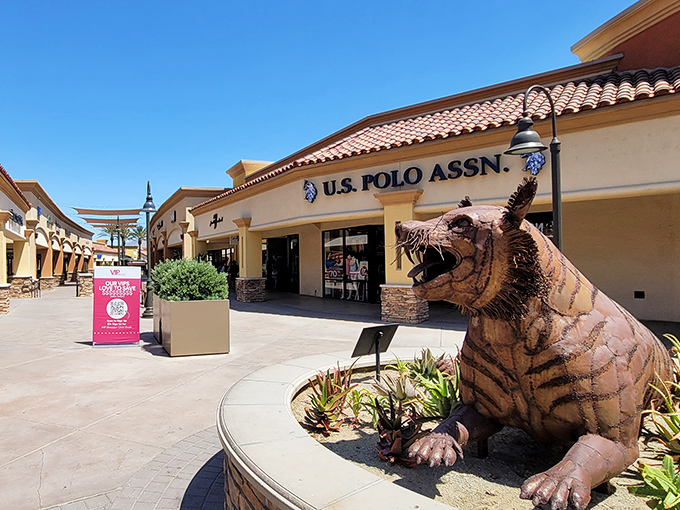 Desert mountains stand guard over this luxury outlet oasis where high-end dreams become affordable reality.