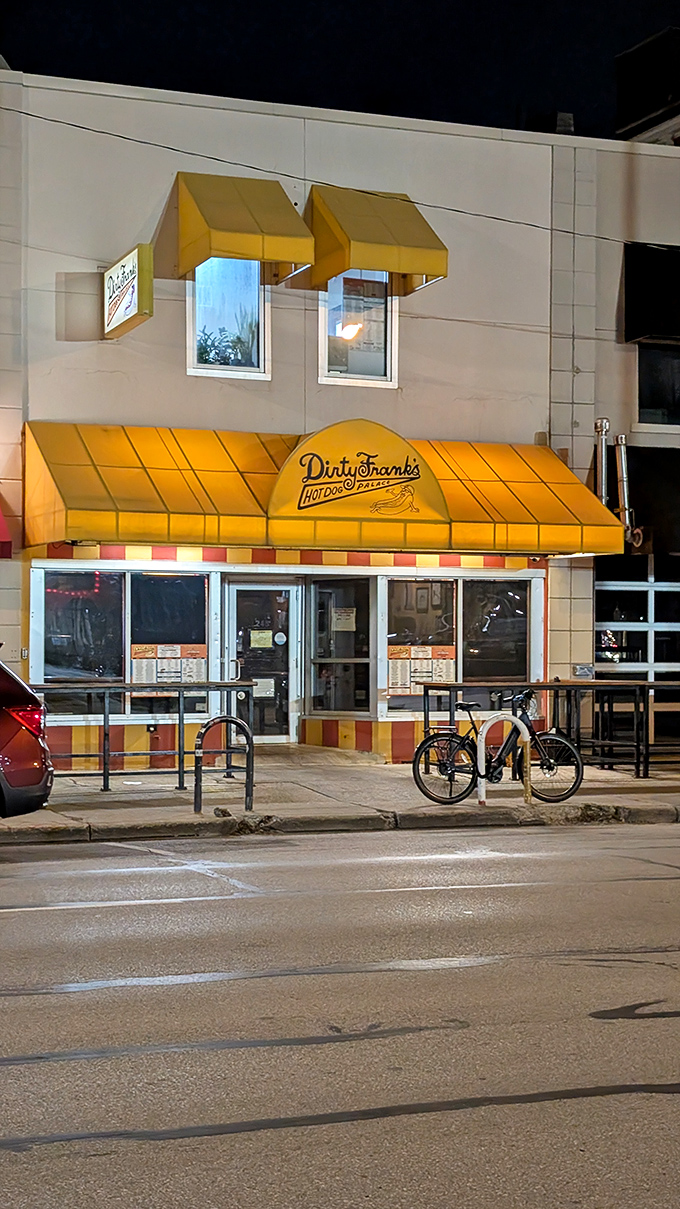 Dirty Frank's retro yellow facade screams fun louder than a carnival barker hawking cotton candy.