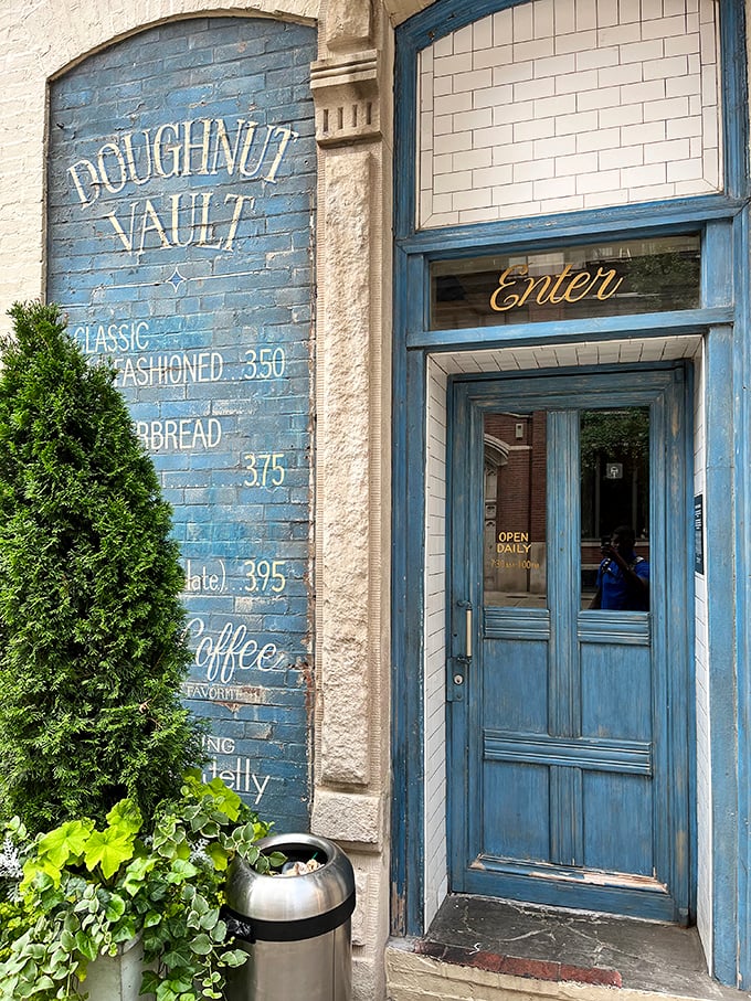 Step through this blue door into donut heaven! Doughnut Vault's vintage entrance feels like discovering a secret passage to sweetness.