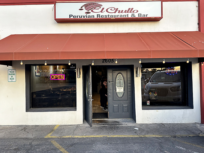 El Chullo's red awning signals serious Peruvian seafood adventures await inside this cozy corner spot.