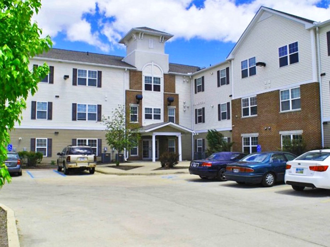 Three stories of sensible living where neighbors become friends over morning coffee conversations.