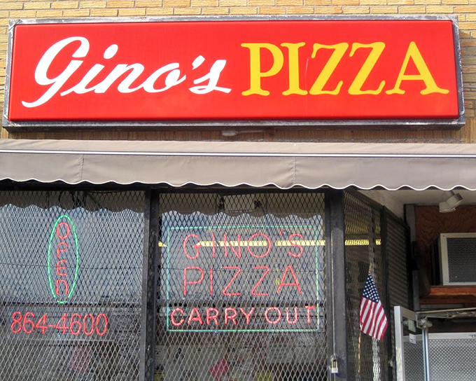 That classic red and yellow sign is like a beacon calling all serious pizza lovers home.