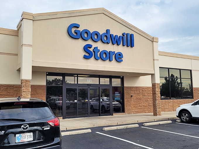 Goodwill's clean, modern storefront welcomes shoppers of all kinds. No pretension, just promises of hidden gems inside.