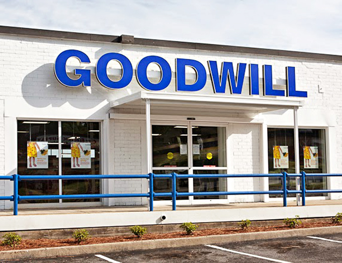 The iconic blue Goodwill sign &ndash; where one person's "I'm done with this" becomes another's "I can't believe I found this!"
