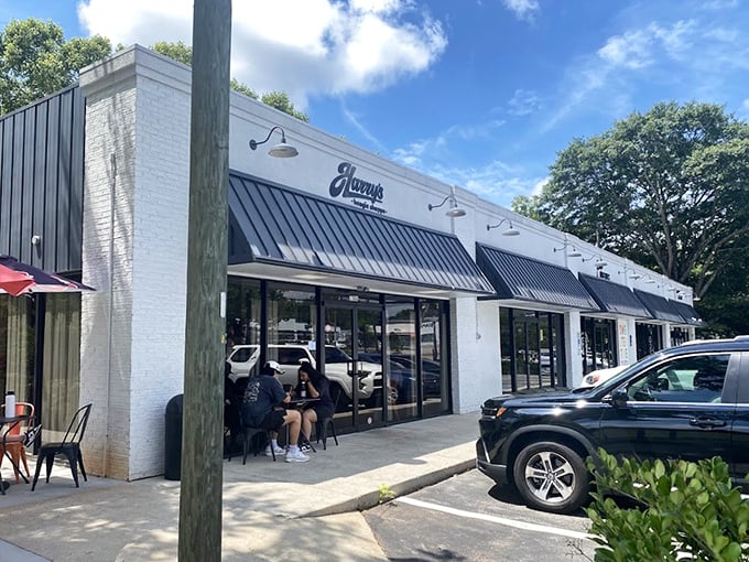 Clean lines and blue awnings mark this Greenville sanctuary where hoagies reach their full potential and dreams come true.
