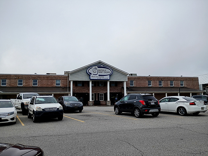 Hartville Thrift Shoppe's colonial-inspired architecture houses a labyrinth of pre-loved treasures beneath moody Ohio skies.