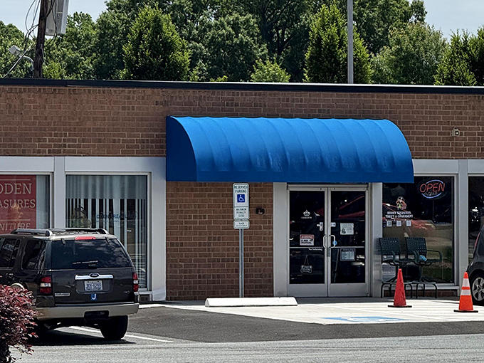 That blue awning isn't just a sunshade&mdash;it's the entrance to a parallel universe where designer labels don't require a second mortgage.
