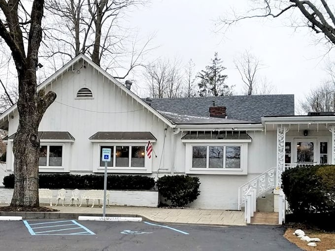 This white cottage looks like it stepped out of a Norman Rockwell painting, complete with comfort food dreams.