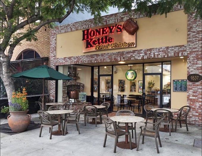 Brick walls and outdoor seating create the perfect backdrop for enjoying seriously crispy, golden fried chicken perfection.