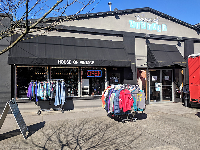 Those outdoor clothing racks are like appetizers before the main course - just a taste of the vintage feast awaiting inside.