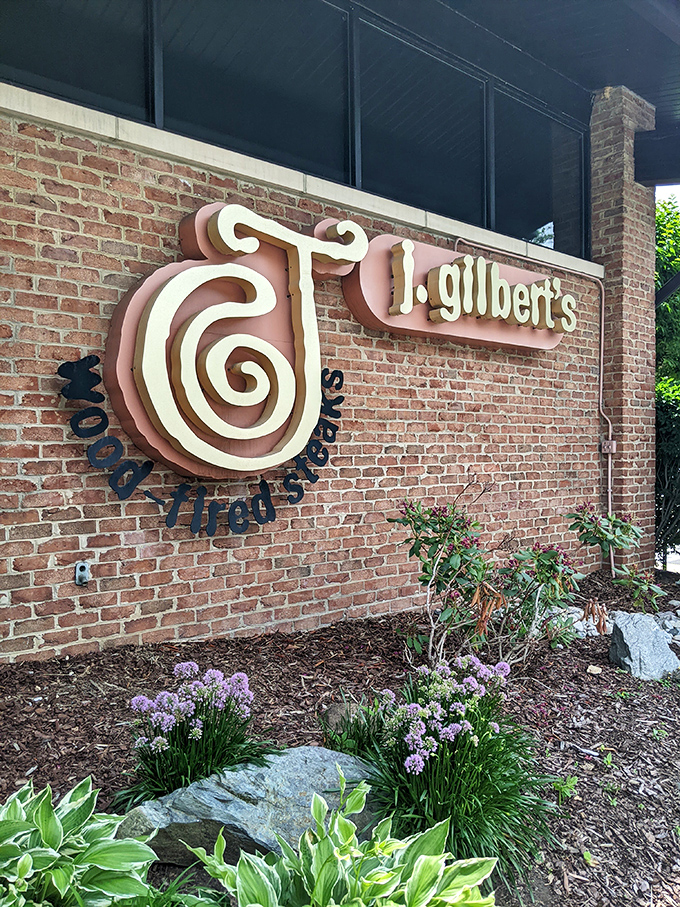 J. Gilbert's brick facade hints at the wood-fired magic happening behind those welcoming doors.