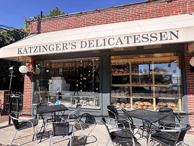 Katzinger's classic deli case displays meats and cheeses like edible artwork in a delicious museum.