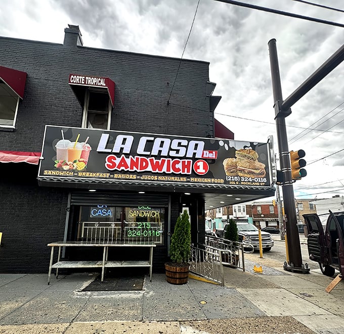 La Casa del Sandwich's bold sign promises big flavors. This corner spot brings Latin flair to the humble sandwich&mdash;and your taste buds will thank you.