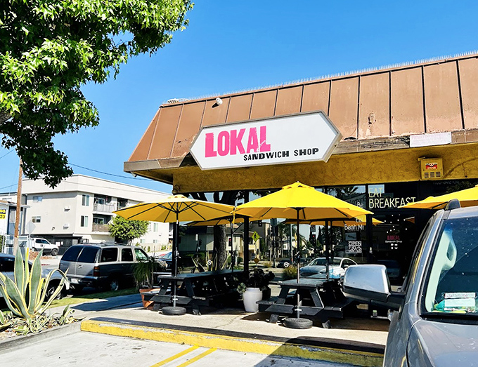 Those sunny yellow umbrellas create an instant oasis of good vibes in the urban landscape.