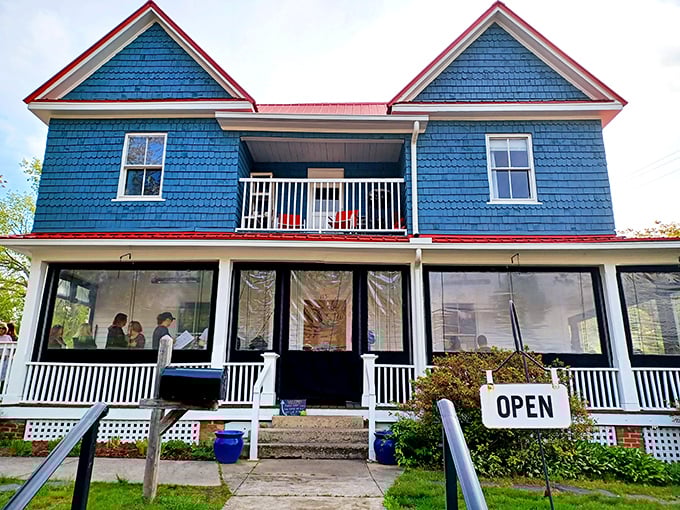 This blue and white Victorian house whispers "come in for biscuits" to every passerby.