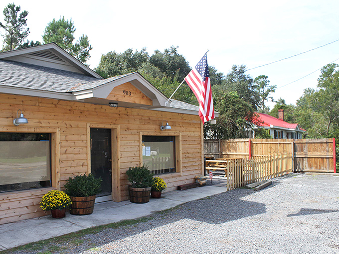 The simple wooden exterior whispers promises of authentic coastal flavors that locals have cherished for years.