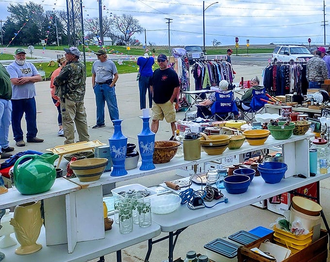 Small-town charm meets big-time bargains as vendors display their wares along this peaceful street.