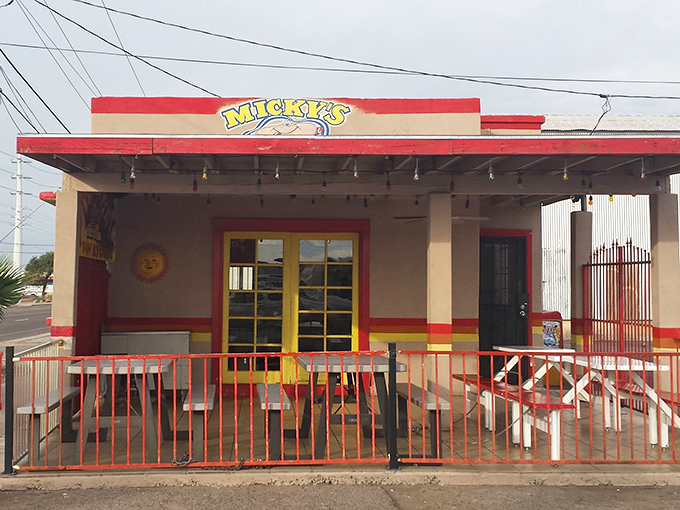 Bright colors and string lights turn a simple meal into a neighborhood celebration worth joining.