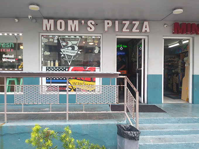 No frills, no fuss—just the kind of straightforward storefront that screams "we put all our effort into the pizza."