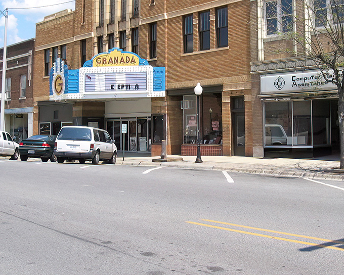 Historic theater marquees still light up Main Street with old-fashioned community entertainment magic.