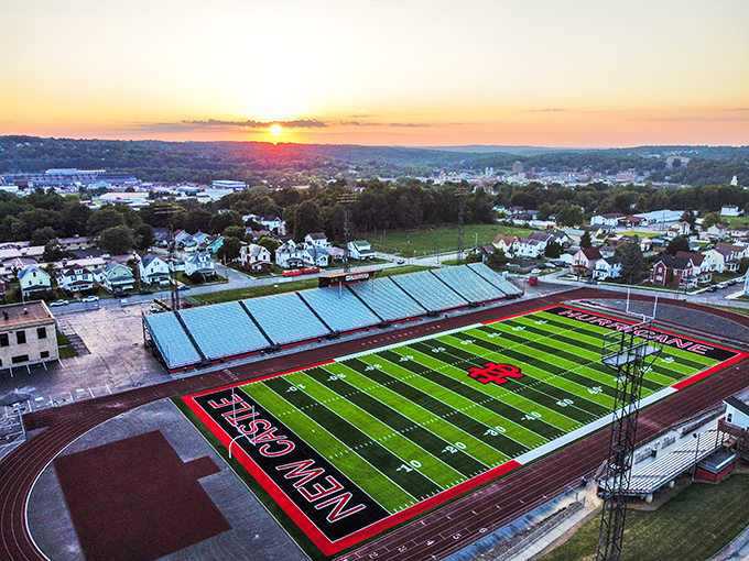 New Castle's beautiful football field gleams under Pennsylvania sunshine, where Friday night lights bring the whole community together.