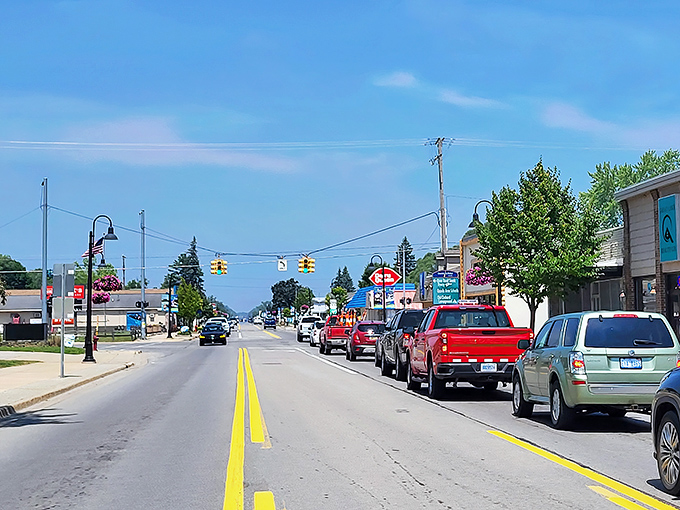 Oscoda's main drag stretches toward Lake Huron like a pathway to affordable paradise, where every dollar counts double.