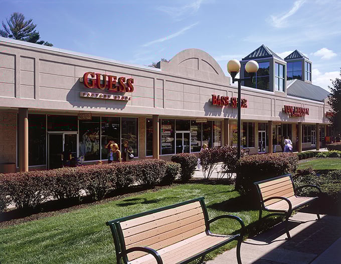 Clean lines and organized chaos - this outlet mall knows how to make serious shopping feel surprisingly civilized.