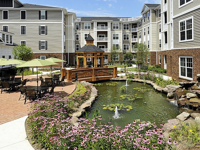 A tranquil pond and gazebo create the perfect backdrop for morning coffee and evening reflections.