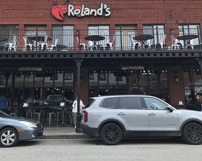 Brick facade with balcony seating where seafood dreams come true. The ocean called—it wants to know Roland's secret.