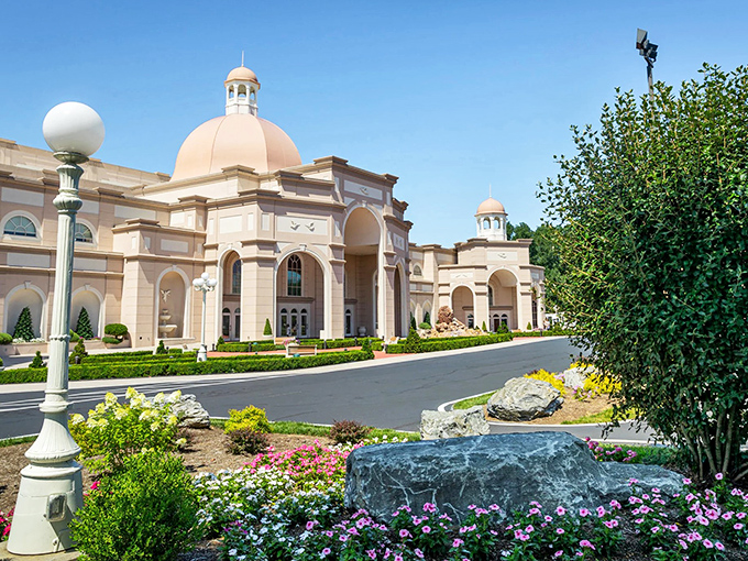Ronks' unexpected palace! Like finding a wedding cake in a field of muffins&mdash;this ornate structure dazzles against its garden backdrop.